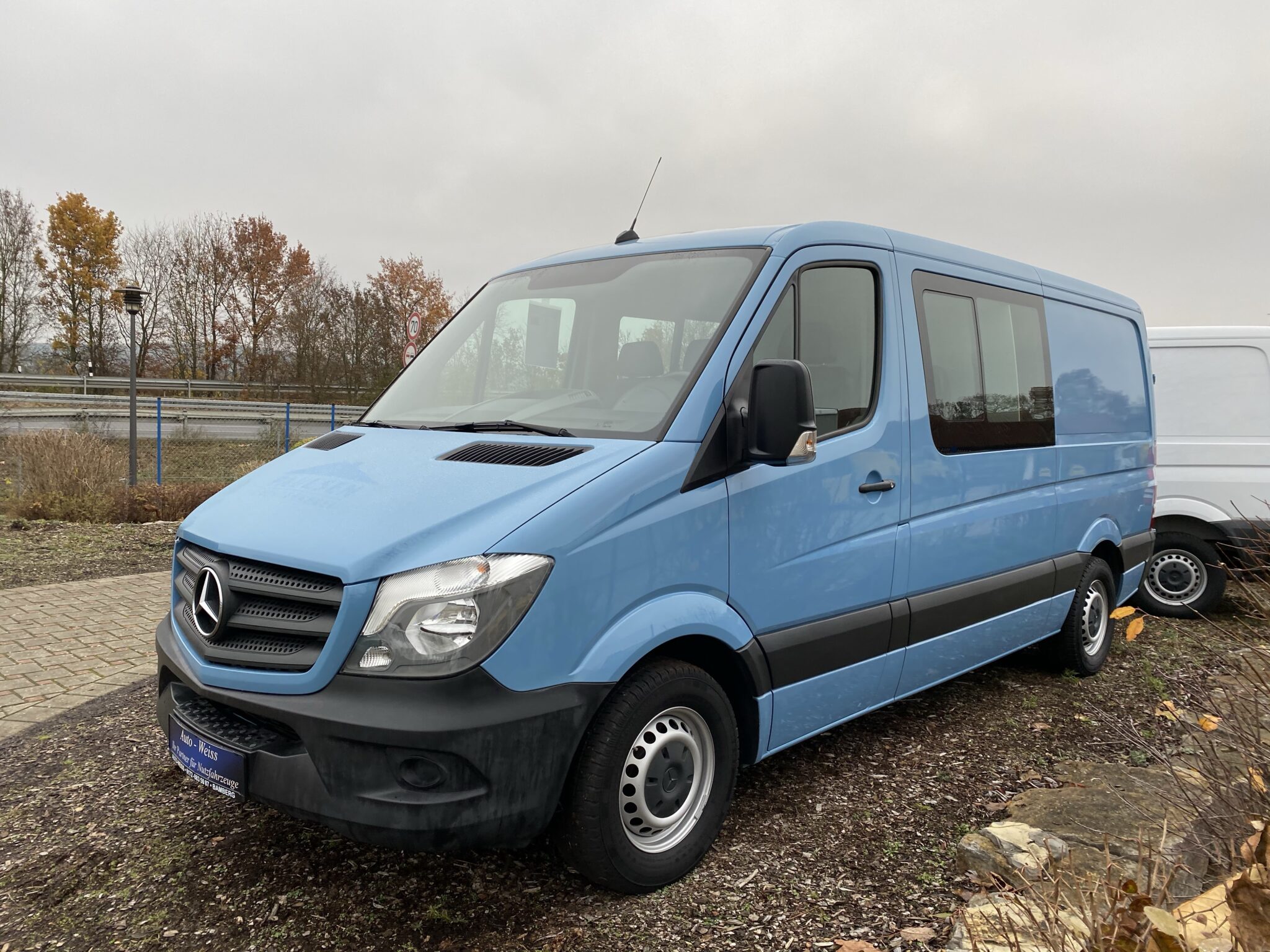 Mercedes Sprinter Selbstausbau Campervan mit Dachzelt
